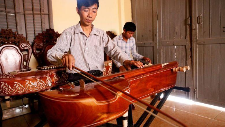 Updated traditional instruments include western music scale - Cambodia ...